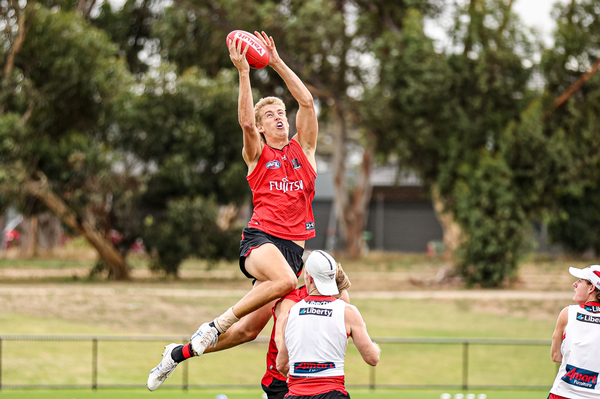 Bryan embracing dual position role