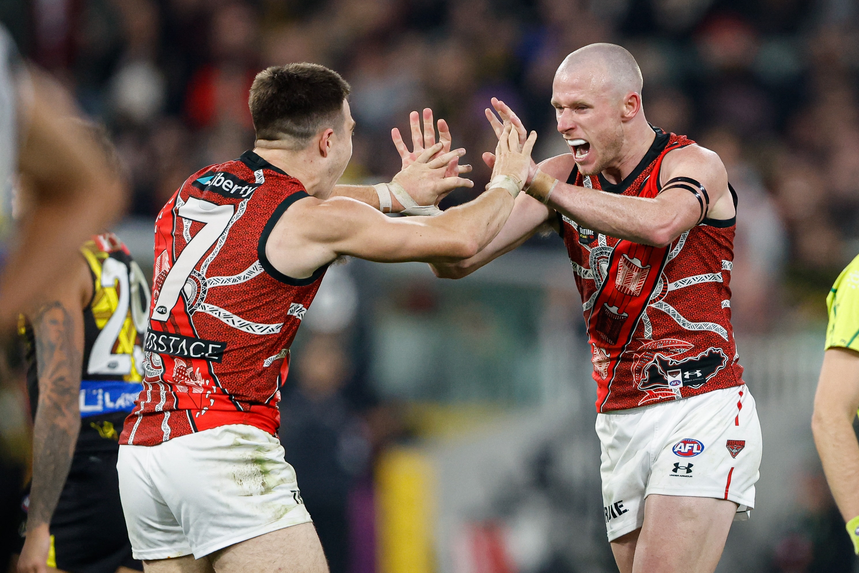 Match report: Bombers hang on to edge past tenacious Tigers