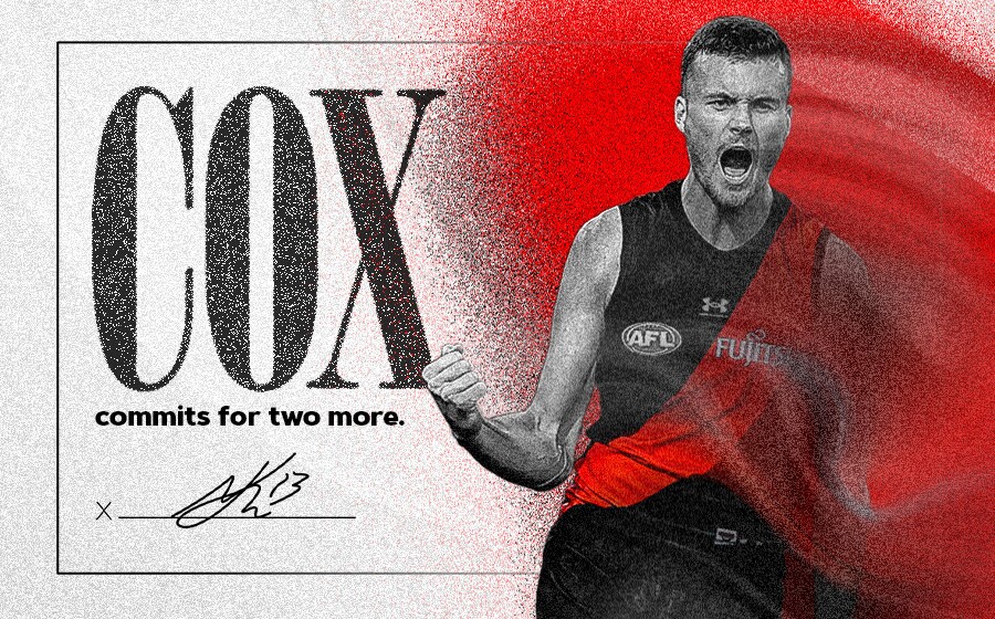 Cox puts pen to paper